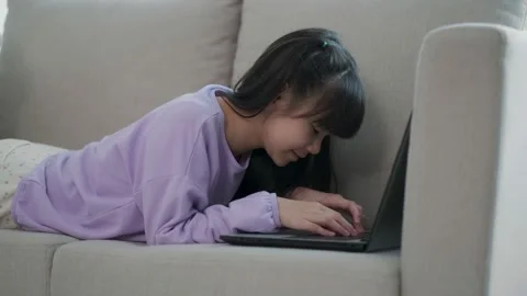 Teenager girl busy to learning looking a... | Stock Video | Pond5