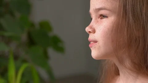 Teenager girl with freckles side view he... | Stock Video | Pond5