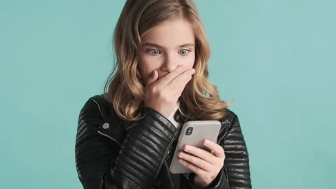 Teenager girl getting message from frien... | Stock Video | Pond5