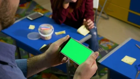 Teenager girl writing on post-it while a... | Stock Video | Pond5