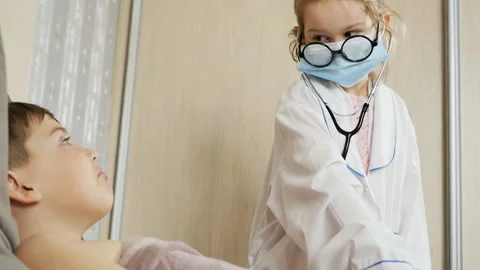 Boy and Girl Playing Doctor and Patient Stock Videos – Royalty-Free HD ...