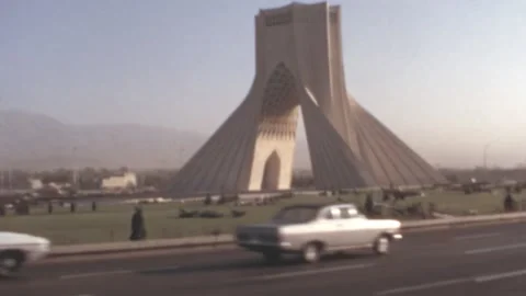 Tehran, Iran - 1973: Cars and buses move... | Stock Video | Pond5