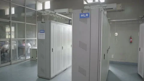 Telecom equipment in racks at server roo... | Stock Video | Pond5