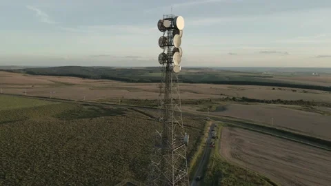 Telecom tower on the side of a road and ... | Stock Video | Pond5