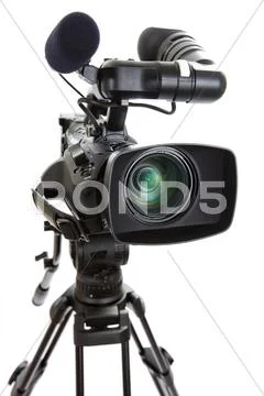 Photograph: Television camera on tripod against white background #23019477