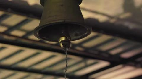 A temple bell ringing inside the temple ... | Stock Video | Pond5