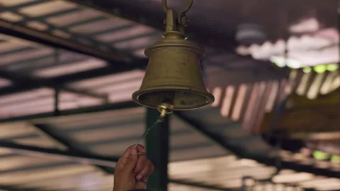 A temple bell ringing inside the temple ... | Stock Video | Pond5