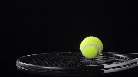 tennis ball bouncing on racket slow moti... | Stock Video | Pond5