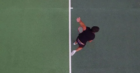 Tennis Player Serves ball up towards cam... | Stock Video | Pond5