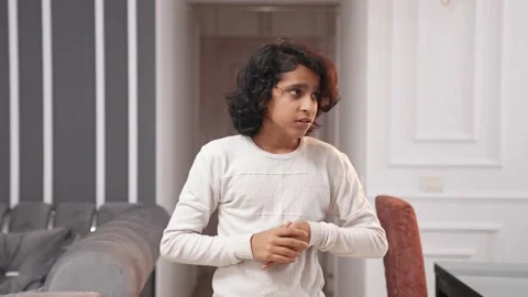 Tensed Indian kid boy thinking about som... | Stock Video | Pond5