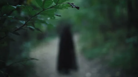 A terrible black figure without a face i... | Stock Video | Pond5