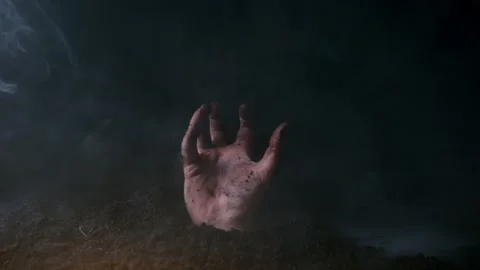 A terrible hand with claws emerges from ... | Stock Video | Pond5