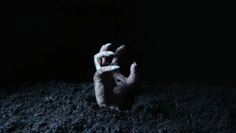 A terrible hand with claws emerges from ... | Stock Video | Pond5