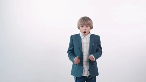 Terrified handsome boy screams in horror... | Stock Video | Pond5