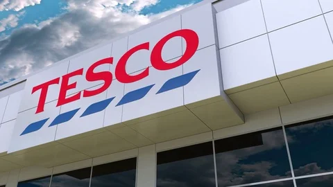 Tesco logo on the modern building facade... | Stock Video | Pond5