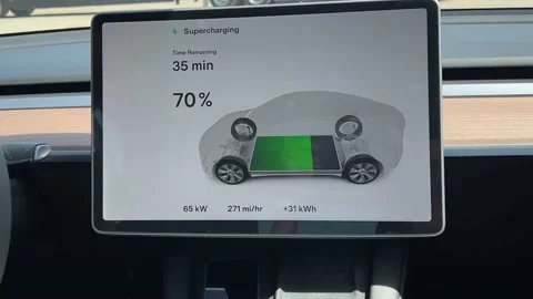 A Tesla Electric Car screen showing it i... | Stock Video | Pond5
