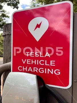 TESLA electric vehicle charge point sign Stock Image #233586076