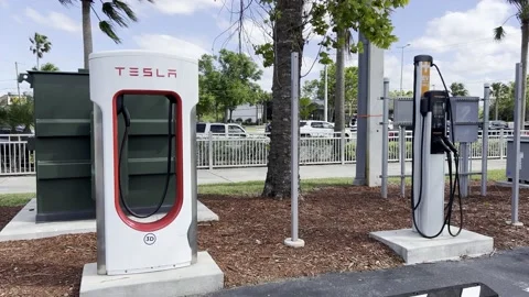 TESLA Electric vehicle charging station | Stock Video | Pond5