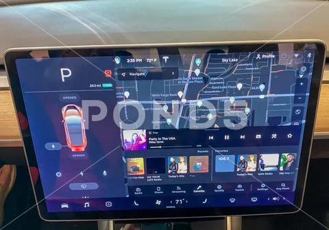 A Tesla Model 3 15 inch touchscreen at a Tesla retail store ~ Premium ...