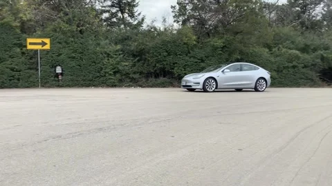 Tesla Model 3 auto drive feature consume... | Stock Video | Pond5