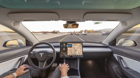 Tesla Model 3 autonomous electric vehicl... | Stock Video | Pond5