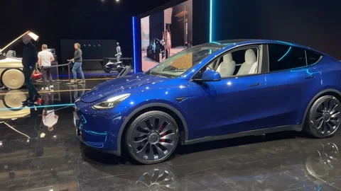 Tesla Model Y battery electric compact c... | Stock Video | Pond5