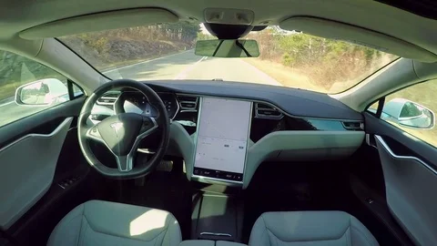 Tesla self-driving fully autonomous car ... | Stock Video | Pond5