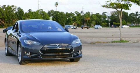 Tesla summon mode autopilot driverless c... | Stock Video | Pond5