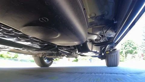Test drive. View of the car from below. ... | Stock Video | Pond5