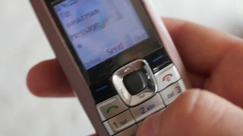 texting on outmoded, old school model of... | Stock Video | Pond5