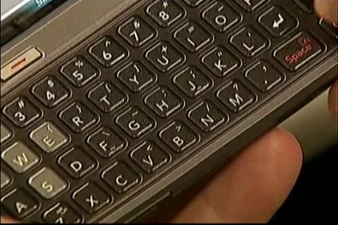 Texting on Slider phone black keyboard -... | Stock Video | Pond5