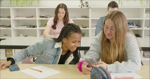 Texting Students Gossip or Viral Social ... | Stock Video | Pond5