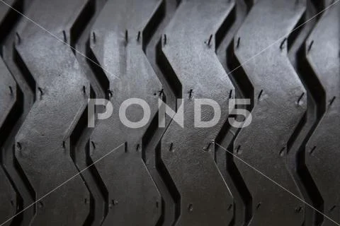 The texture of rubber car tires, vertical wavy pattern Stock Image ...