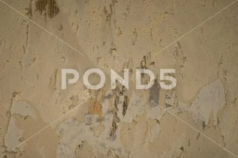 Texture of stripped wallpaper from wall. Paper is torn. Repair details ...