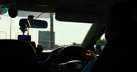 Thai Taxi Driver Inside a Cab Driving on... | Stock Video | Pond5