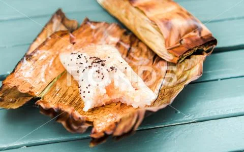 Thai traditional dessert. Grilled Taro Stuffed Coconut Sticky Rice ~ Hi ...