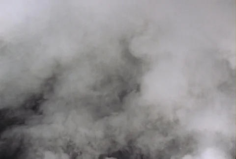 Thick gray smoke rising and filling fram... | Stock Video | Pond5