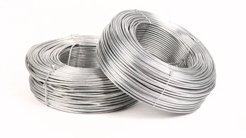 Thick silver wire in coil. Stainless ste... | Stock Video | Pond5