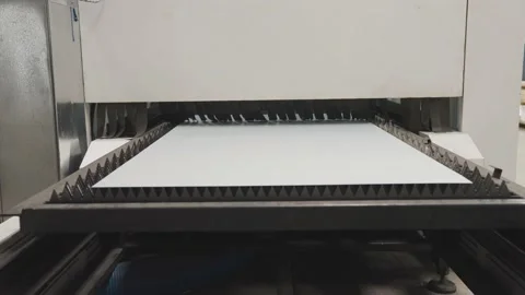 Thin metal sheet sliding into computer n... | Stock Video | Pond5