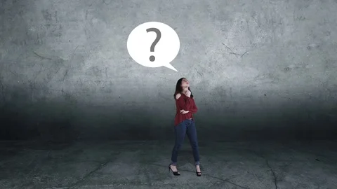 Thoughtful woman looking at question mar... | Stock Video | Pond5