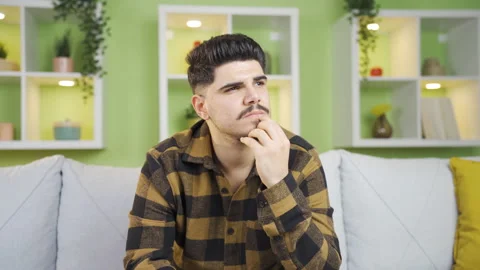 The thoughtful young man cannot produce ... | Stock Video | Pond5