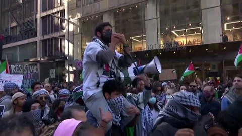 Thousands march through NYC's Times Squa... | Stock Video | Pond5