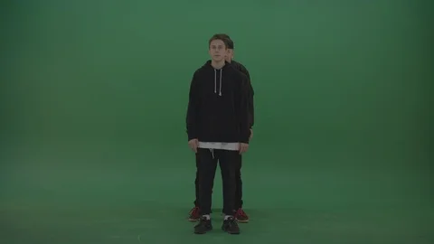 Three boys break dance in a green screen... | Stock Video | Pond5