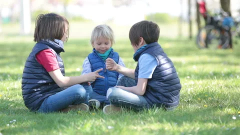 Three children, boy brothers, playing ro... | Stock Video | Pond5