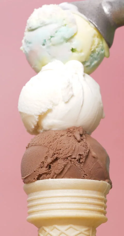 Three flavors of ice cream stacked on co... | Stock Video | Pond5