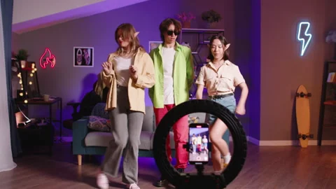 Three Gen Z friends record trending reel... | Stock Video | Pond5