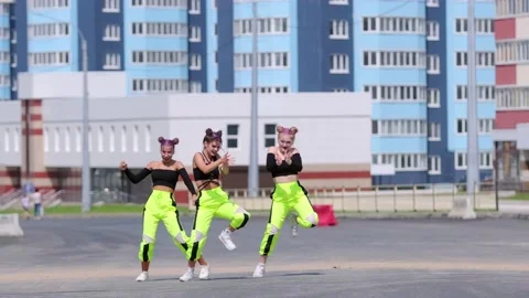 three girls dancing hip hop on the backg... | Stock Video | Pond5