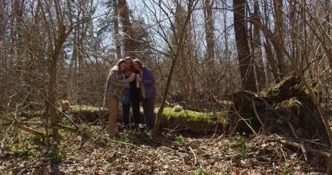 three girls in forest are talking lookin... | Stock Video | Pond5