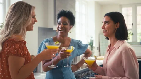 Three Mature Female Friends At Home Havi... | Stock Video | Pond5