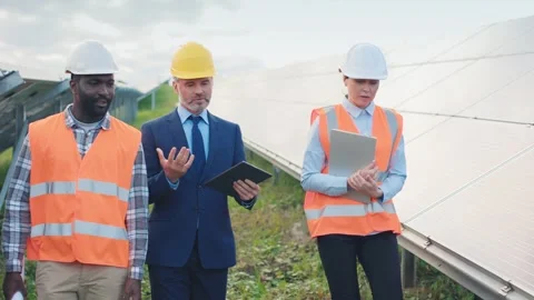 Three multicultural workers walking and ... | Stock Video | Pond5